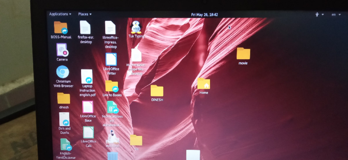 Ios Linux - Applications Places BOSS-Manual firefox-esr. libreoffice Camera Chromium Web Browser ...